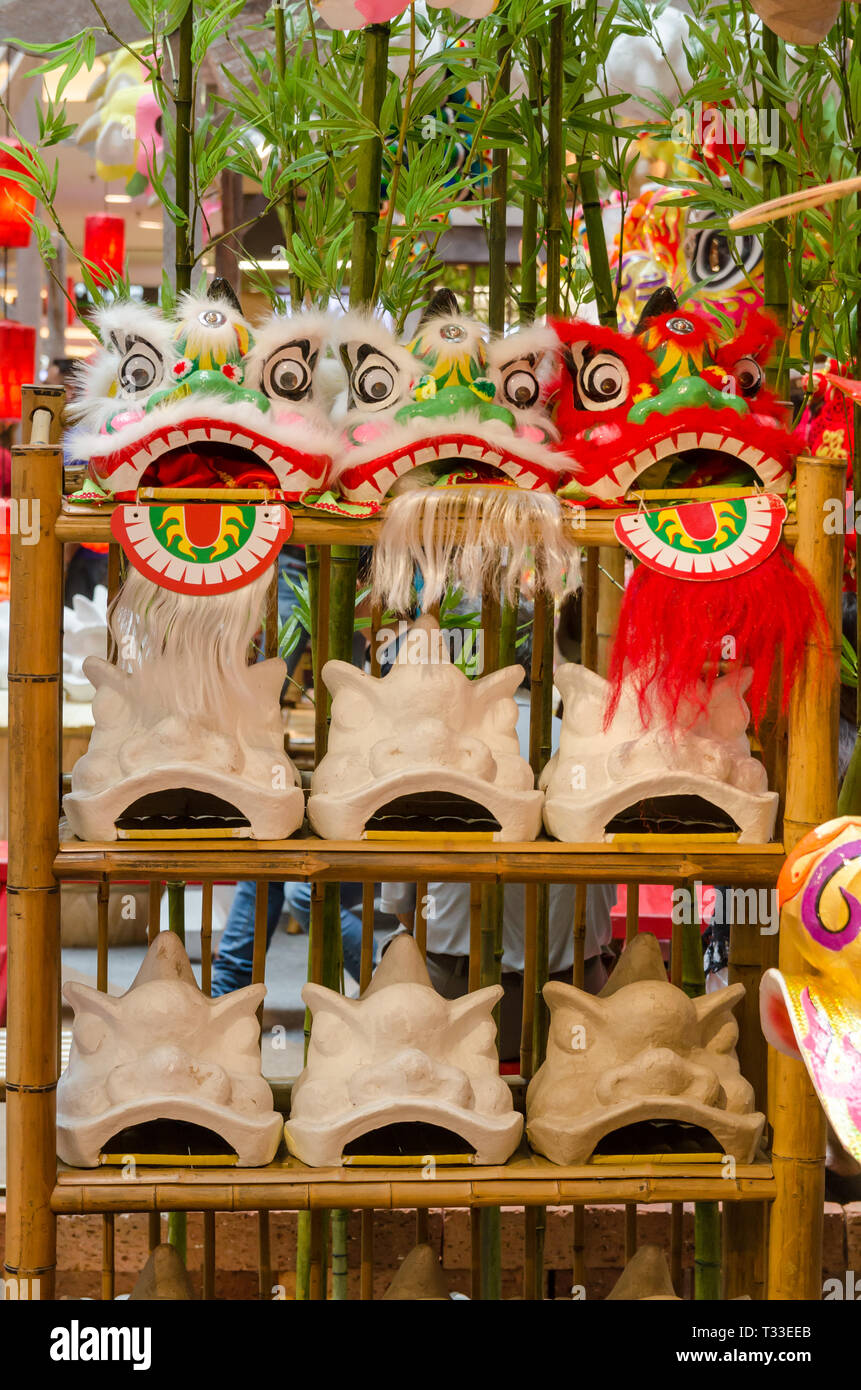 Traditional chinese lion dance head mold display on the shelves Stock ...
