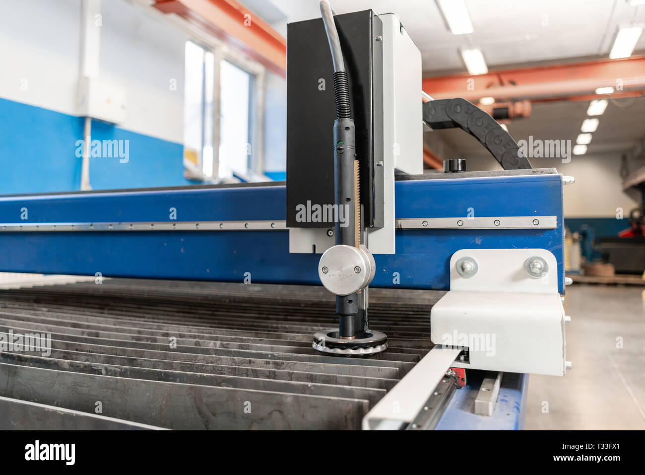 Industrial plasma machine cut of metal plate. New CNC Laser Plasma ...