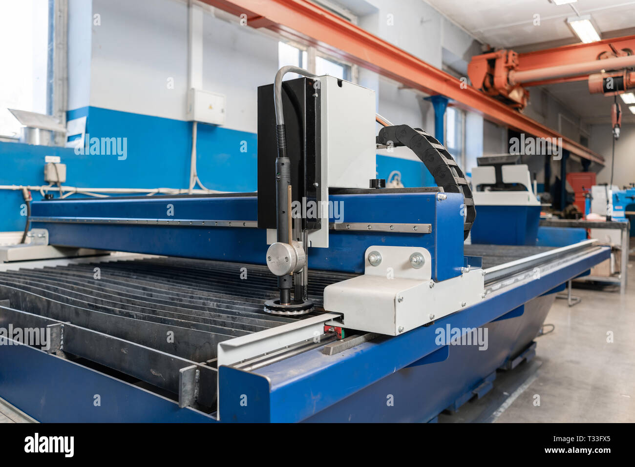 Industrial plasma machine cut of metal plate. New CNC Laser Plasma ...