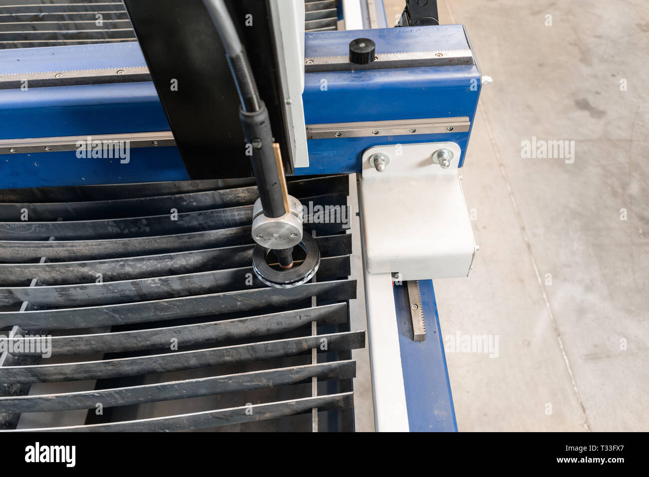 Industrial plasma machine cut of metal plate. New CNC Laser Plasma ...