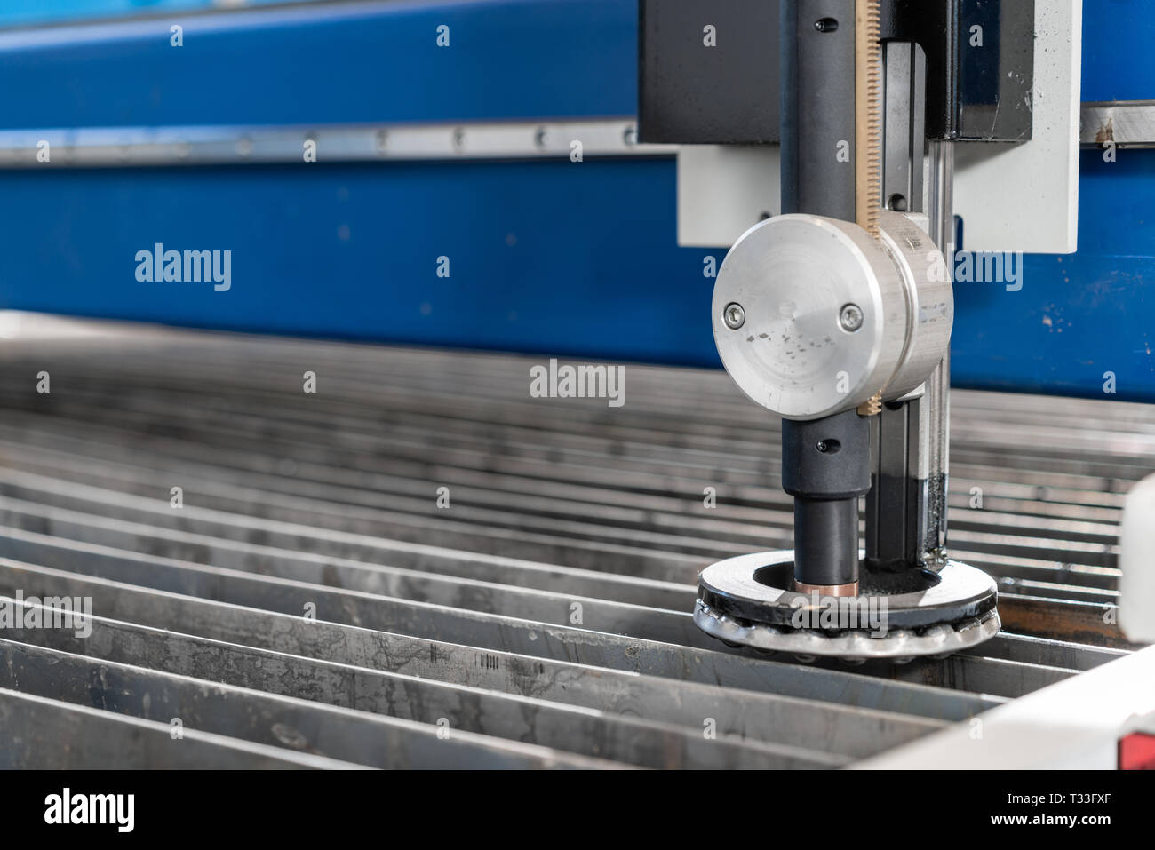 Industrial plasma machine cut of metal plate. New CNC Laser Plasma ...