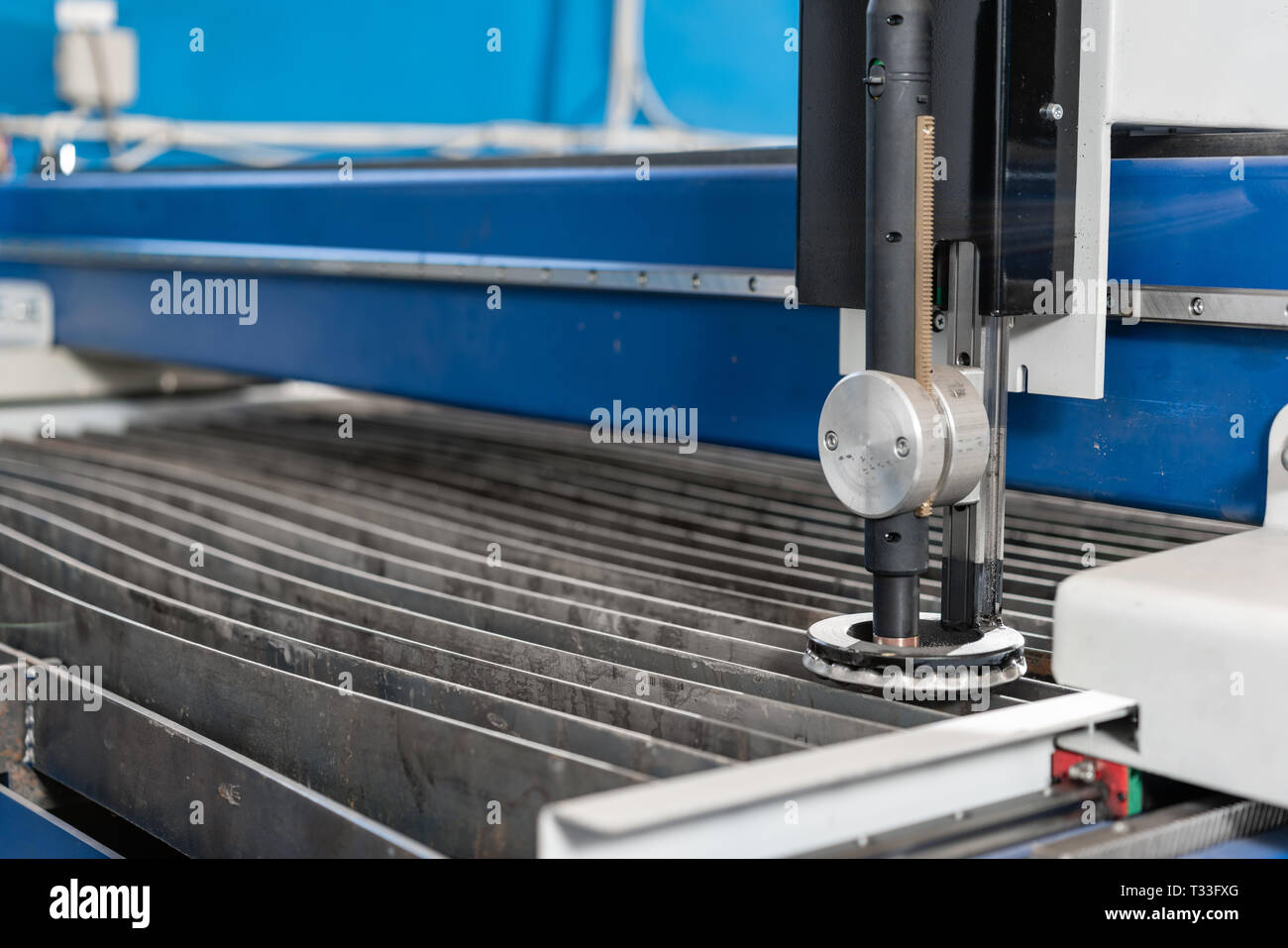 Industrial plasma machine cut of metal plate. New CNC Laser Plasma ...