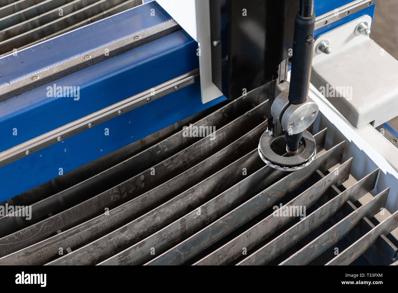 Industrial plasma machine cut of metal plate. New CNC Laser Plasma ...