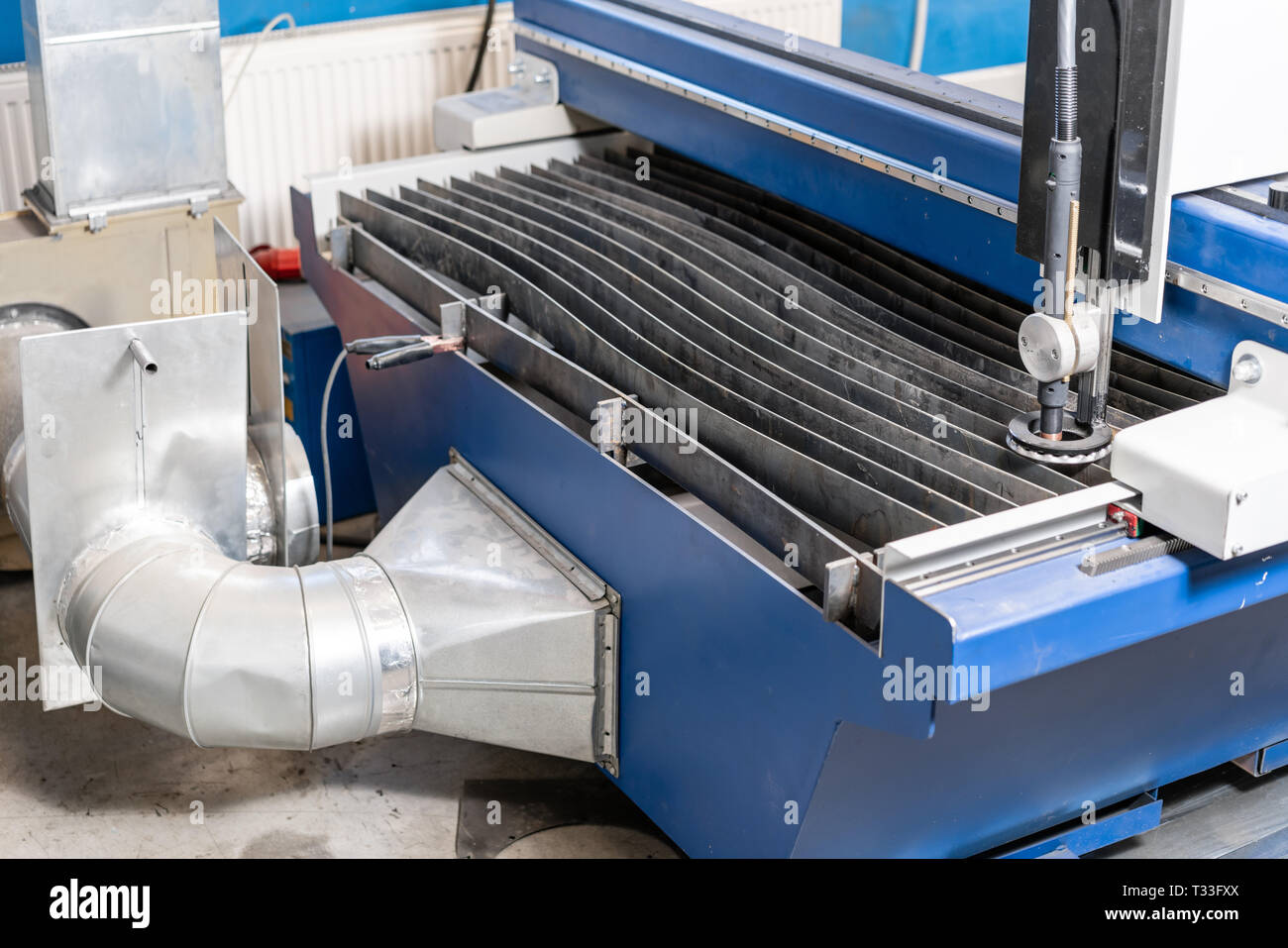 Industrial plasma machine cut of metal plate. New CNC Laser Plasma ...