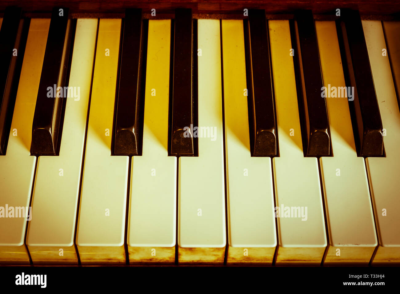 Piano keyboard in sepia color style Stock Photo - Alamy
