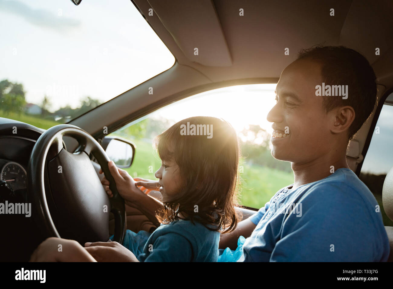 Child car steering wheel parent hi-res stock photography and images - Alamy
