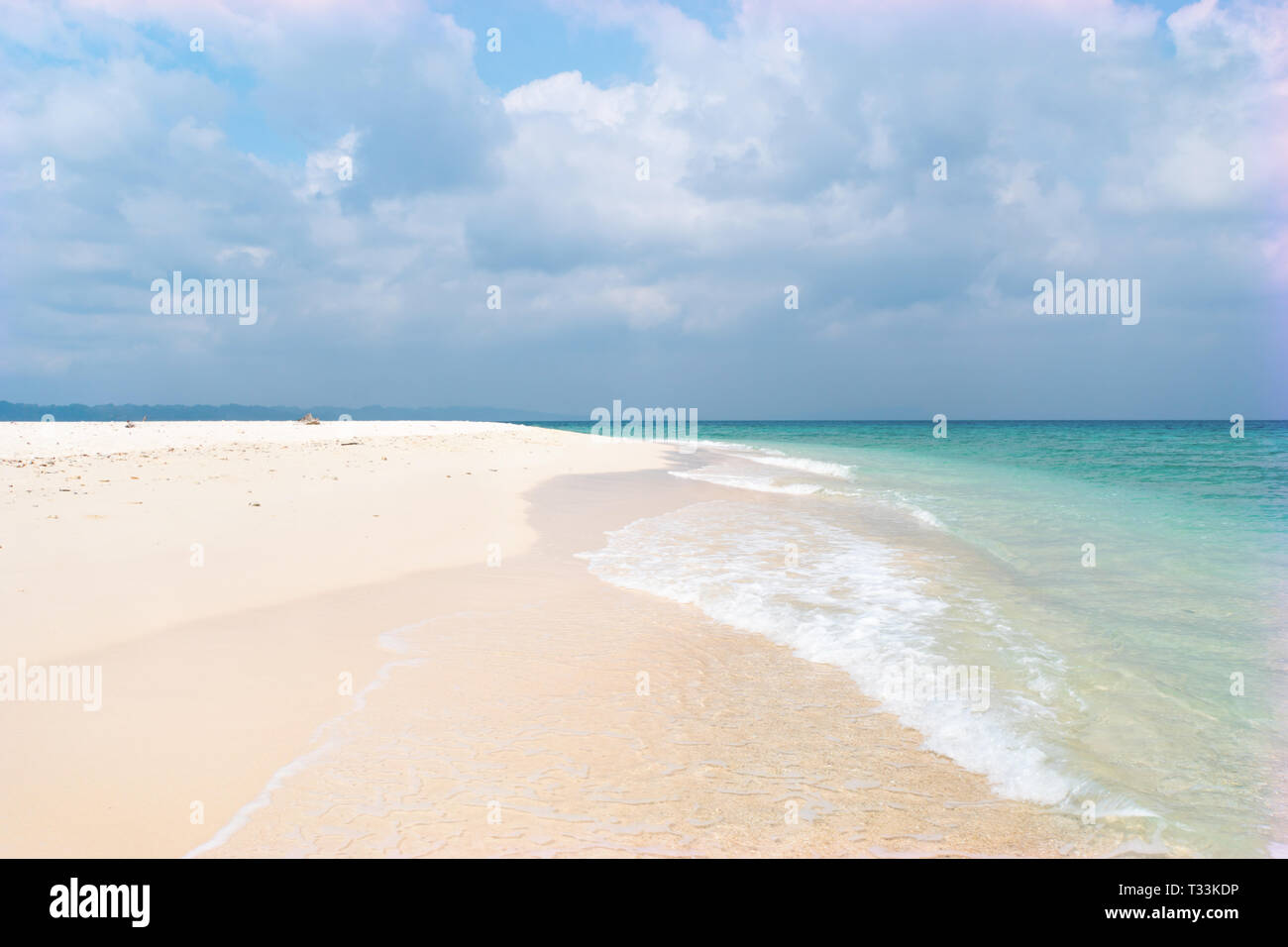 white sand and the blue sky. Sand spit on the island of Neil Andaman ...