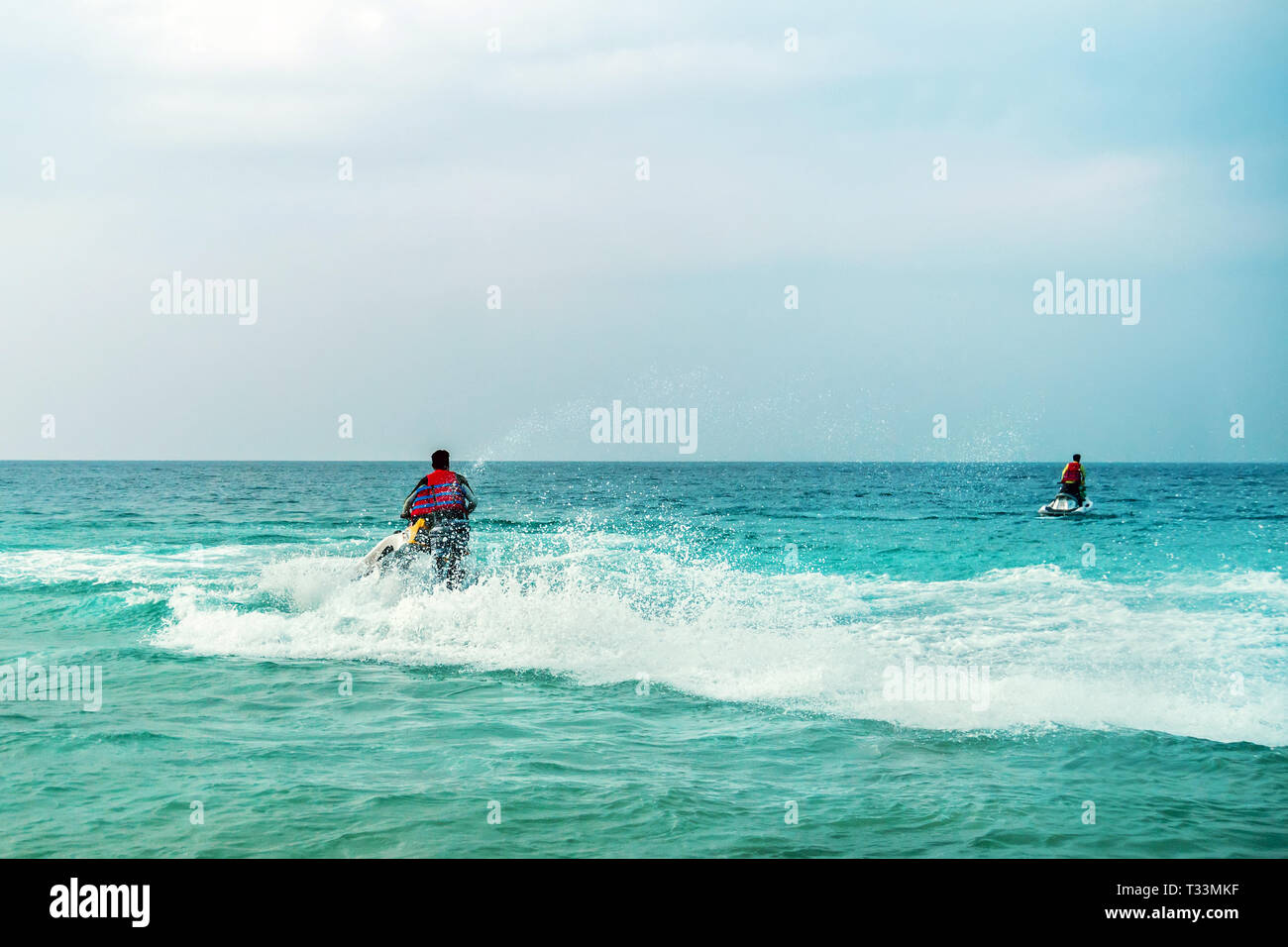 Active leisure on the sea water at the aquabike competition. Summer ...