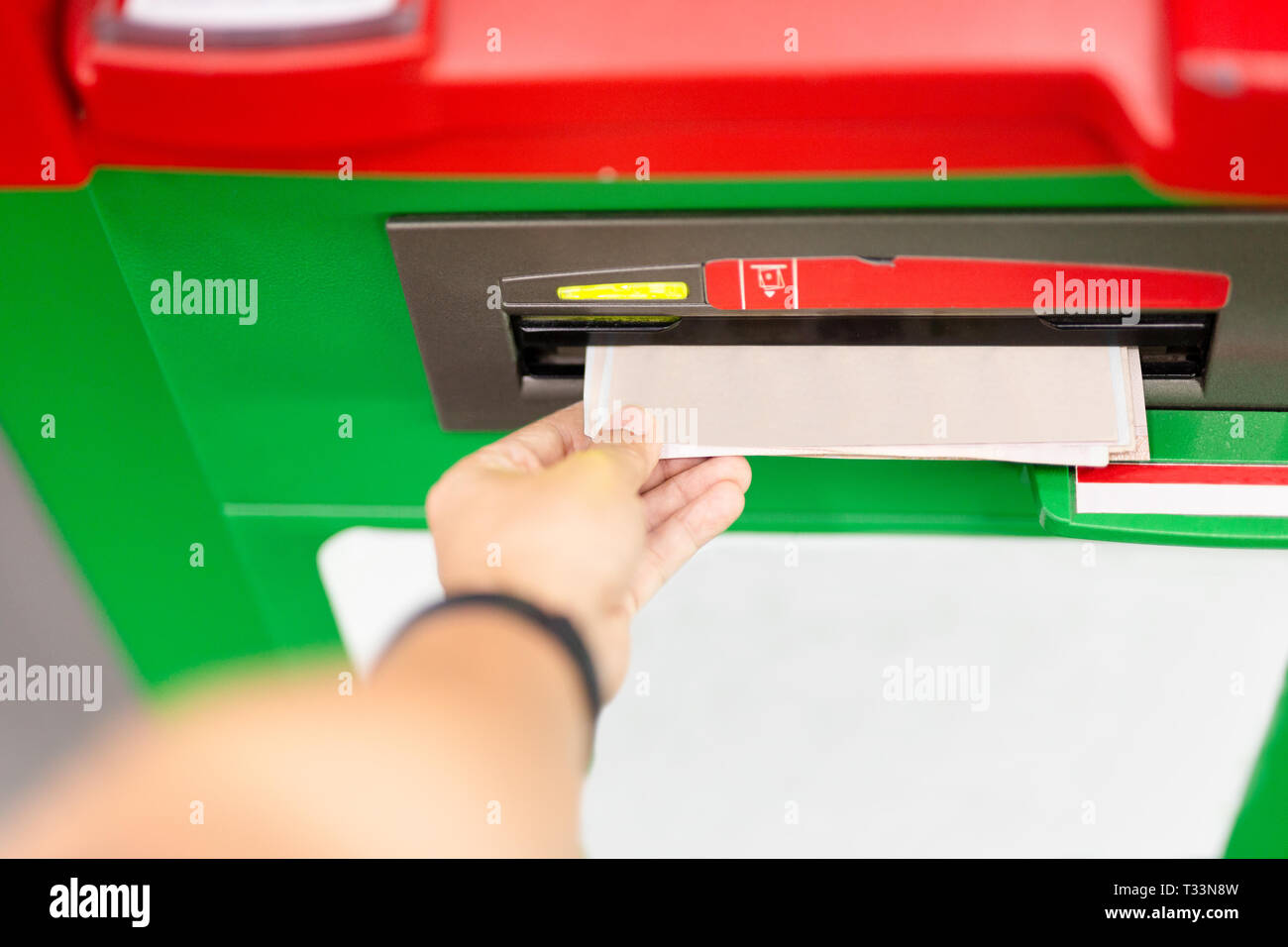 Using an atm machine hi-res stock photography and images - Alamy