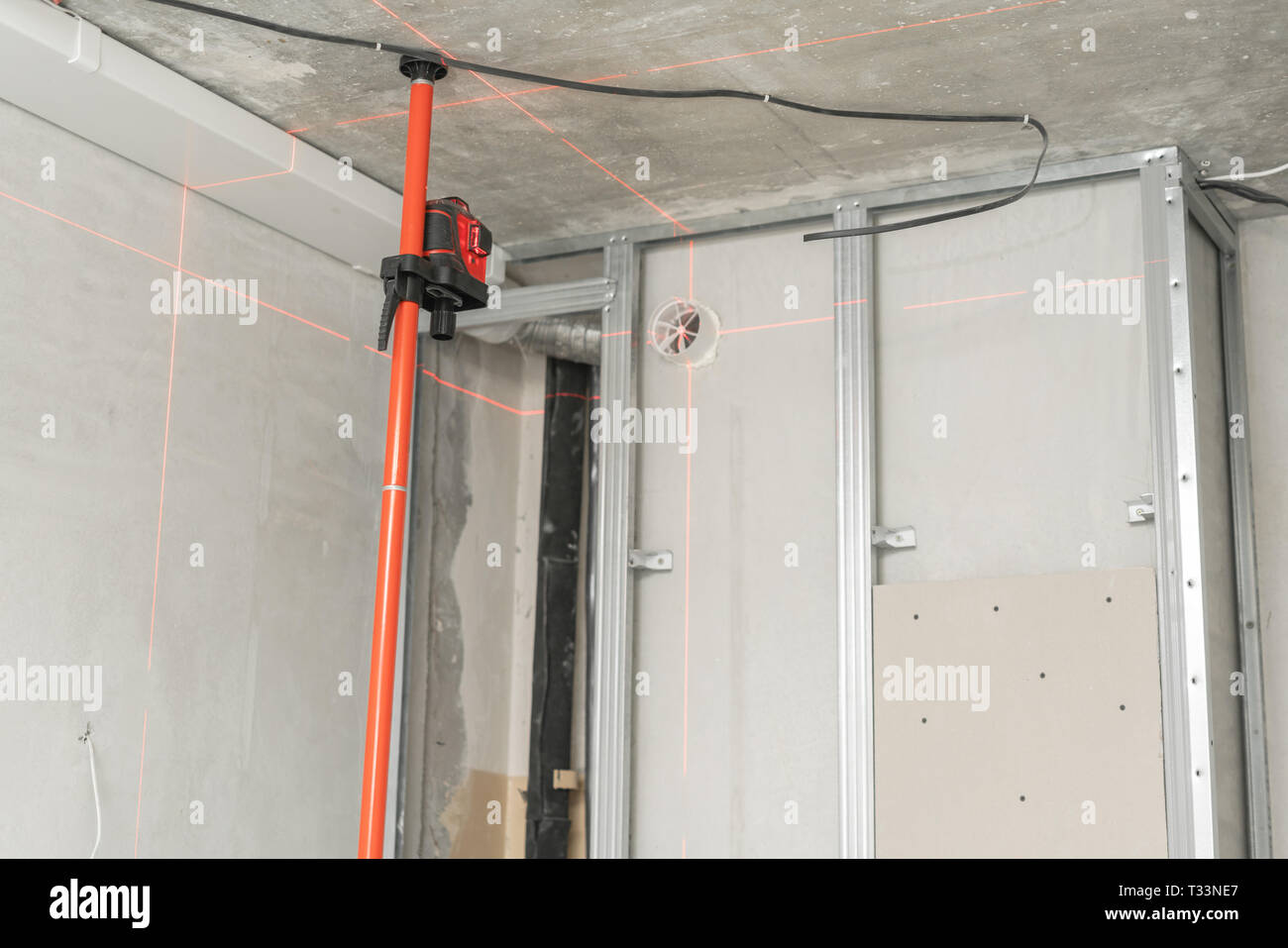 Laser measurement during renovation. Construction tools and equipment ...