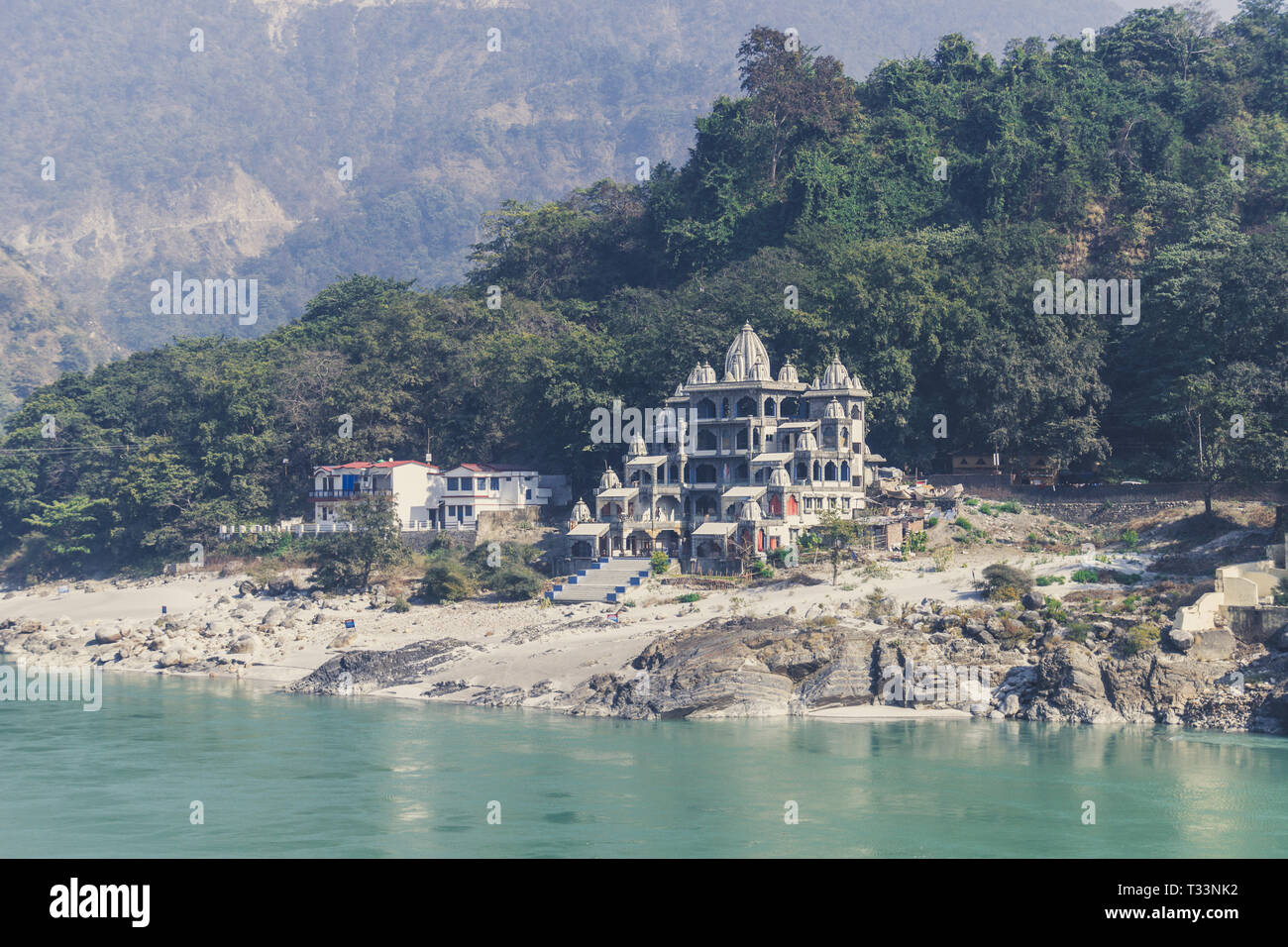 Old Ashram on the Bank of the Ganges river. An ancient temple on a ...
