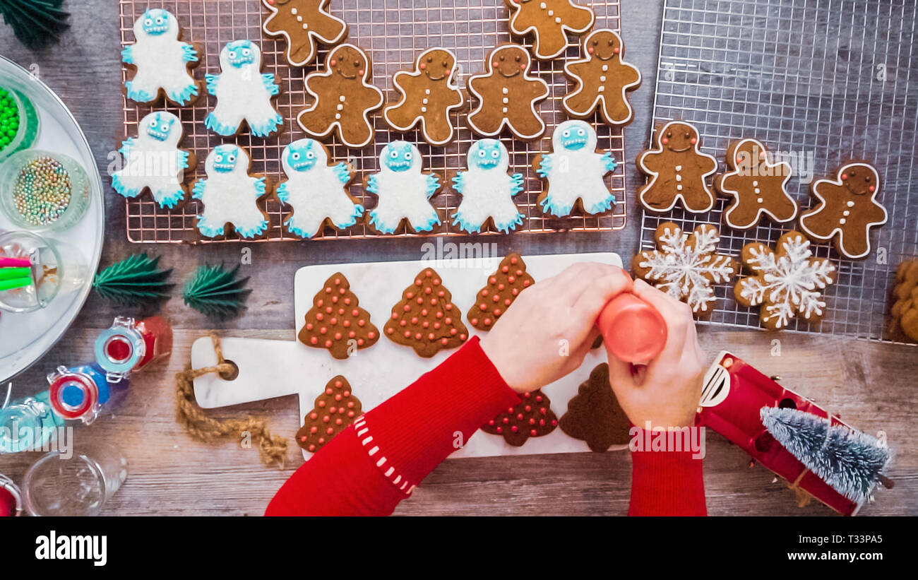 Step by step. Flat lay. Decorating gingerbread cookies with royal icing ...