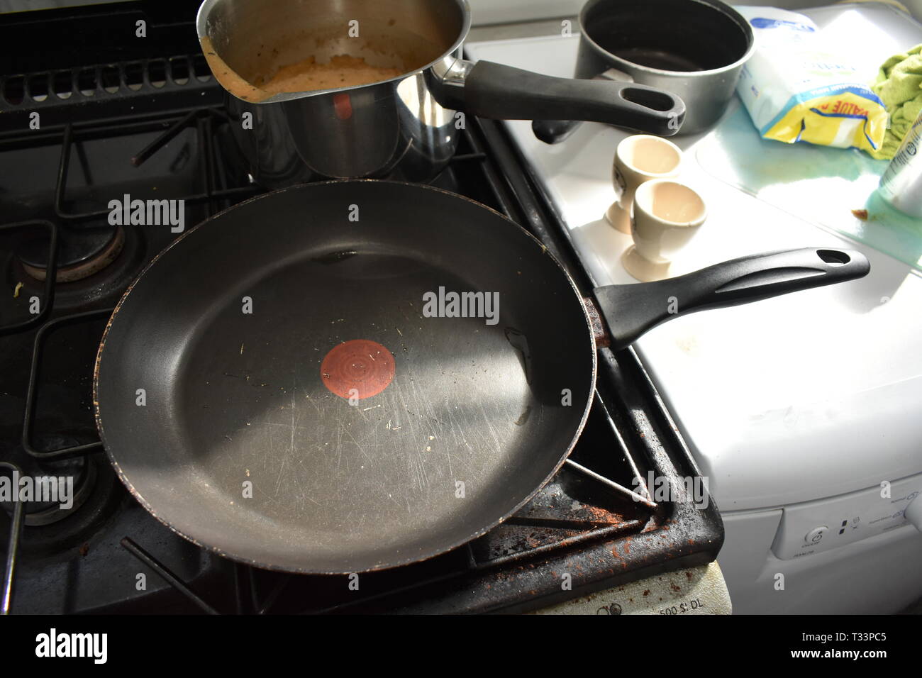 Frying pan in sunlight Stock Photo - Alamy