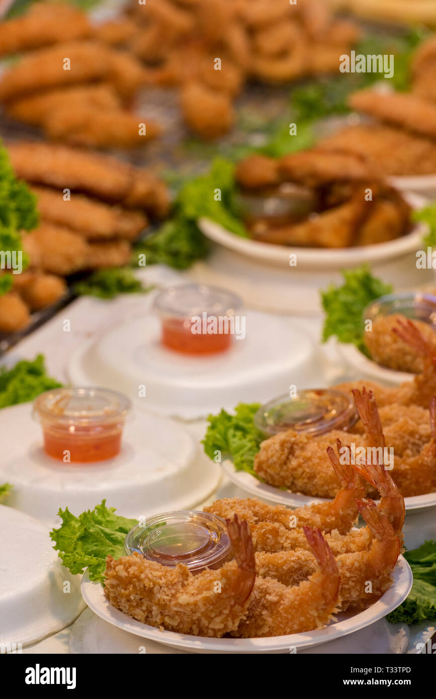 fried shrimps and prawns delicacies on sale at a thailand street food ...