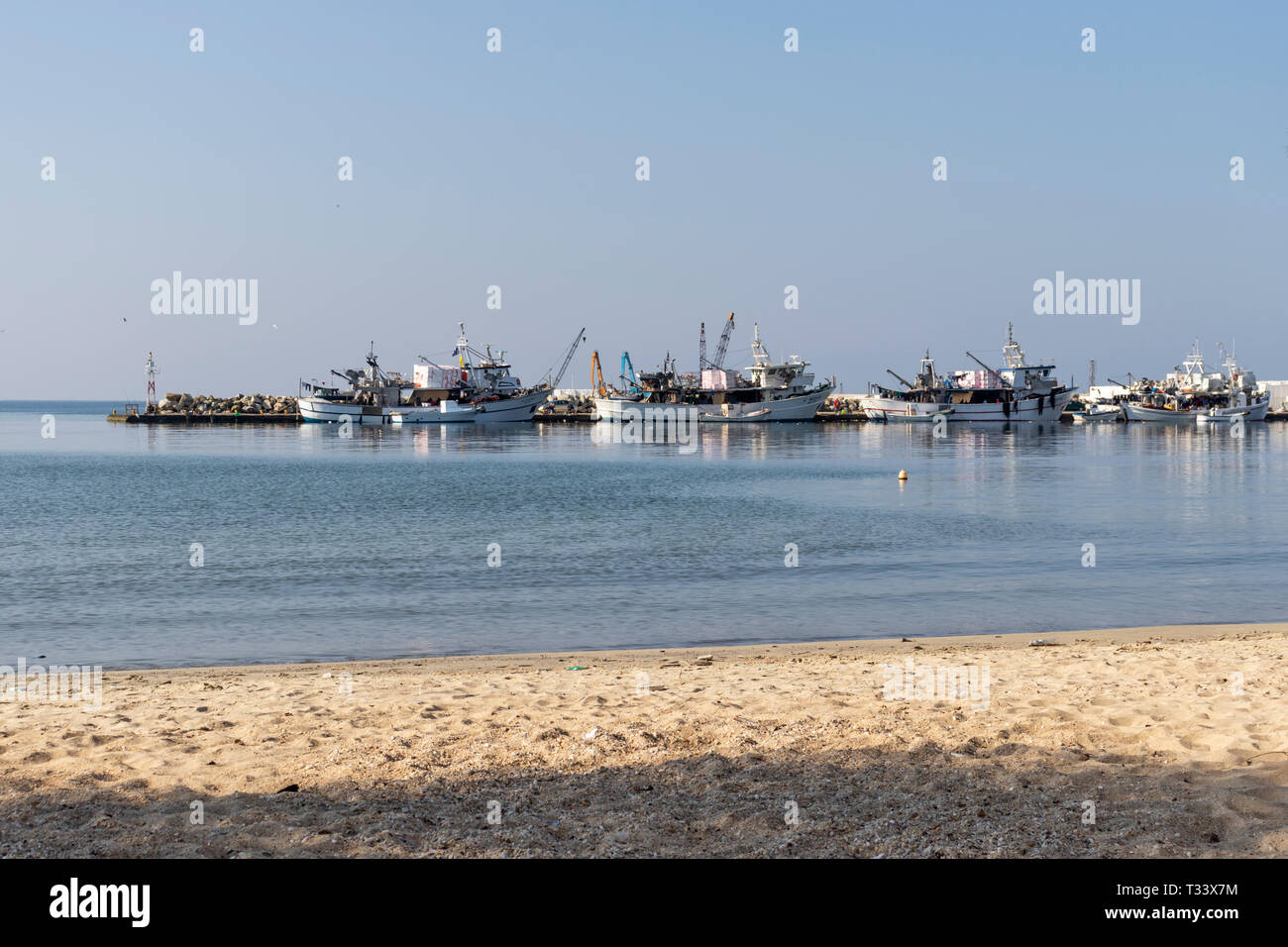 NEA MOUDANIA, GREECE - MARCH 31, 2019: Coastal street of town of Nea ...
