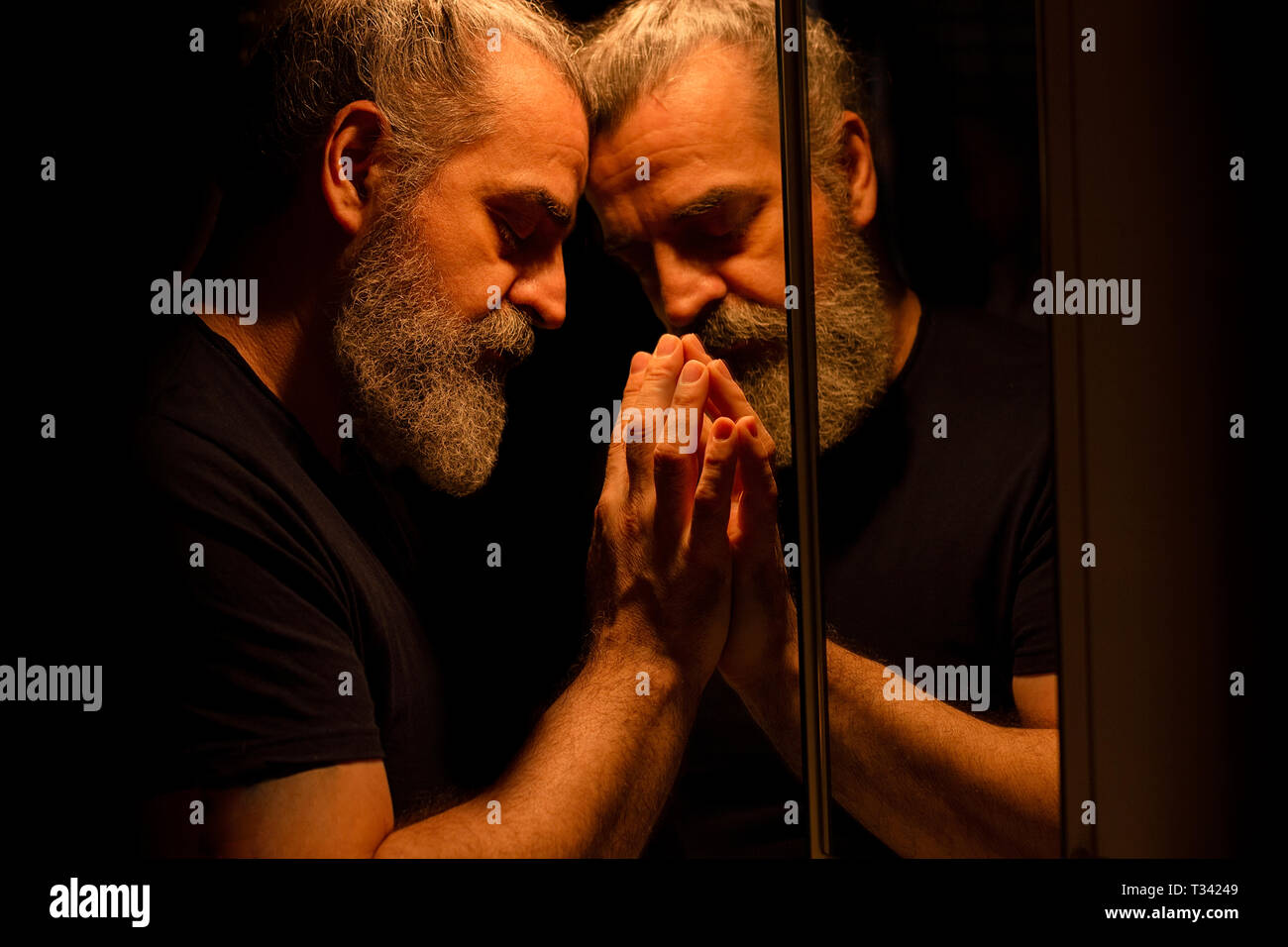 Black male face reflection sad hi-res stock photography and images - Alamy