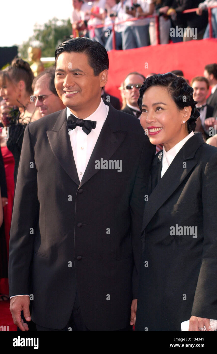 LOS ANGELES, CA. March 25, 2001: Actor CHOW YAN-FAT & wife at the 73rd ...