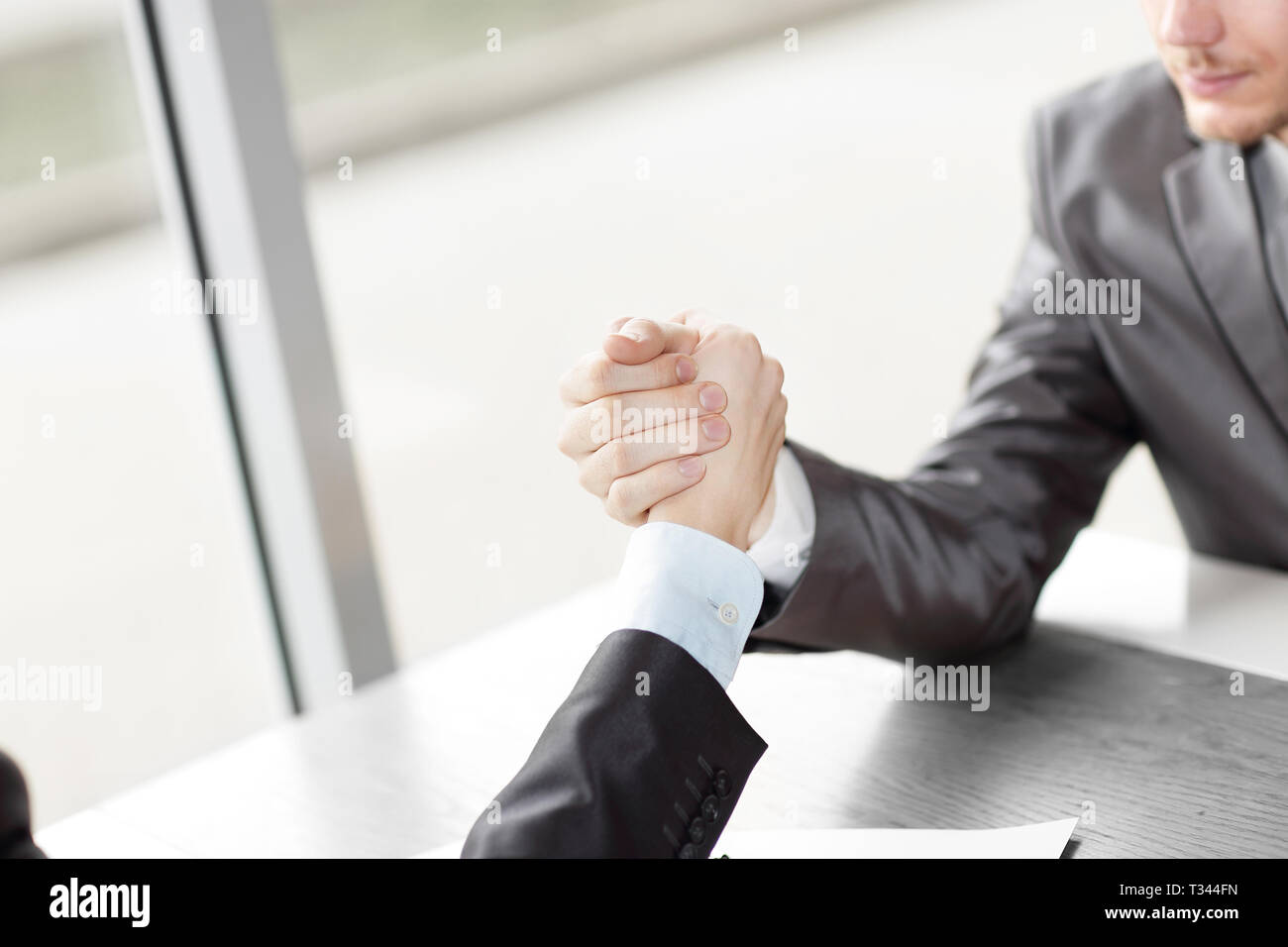 Strong handshake hi-res stock photography and images - Alamy