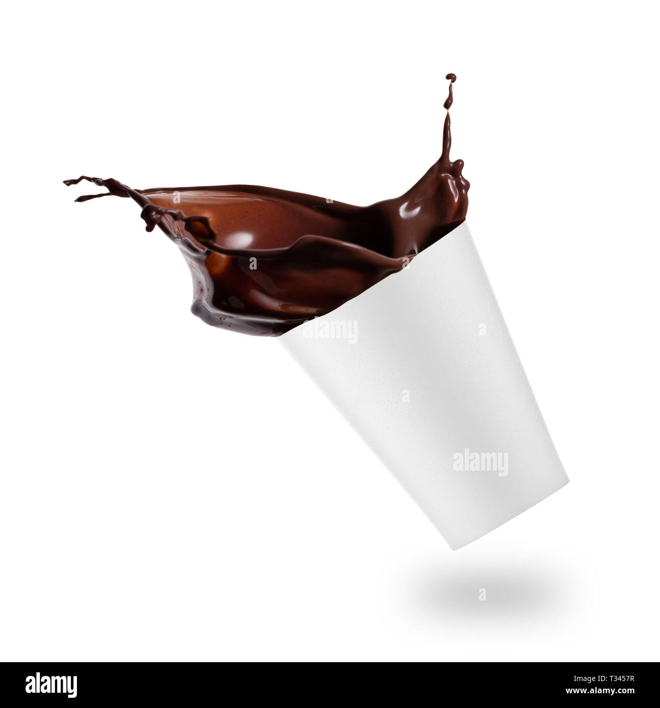 Splash of hot chocolate in a white glass isolated on white background ...