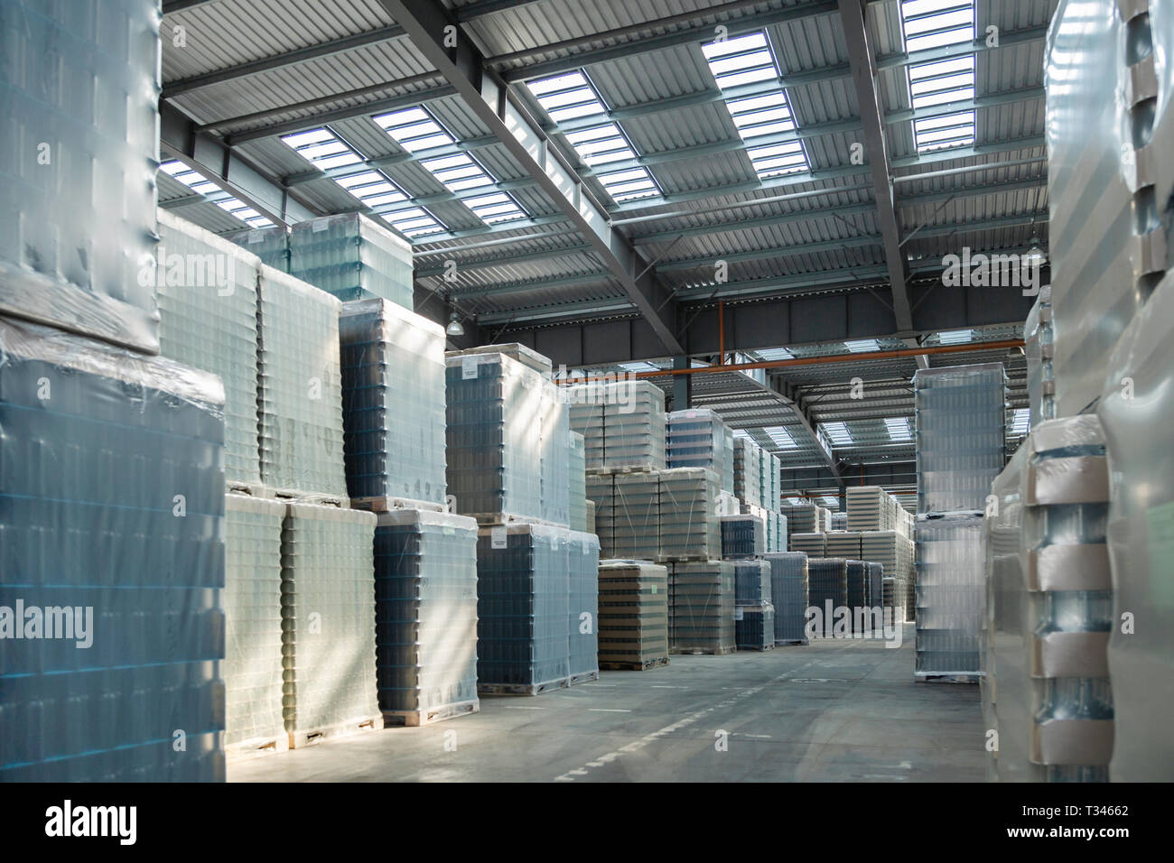Warehouse with packed glass bottles. Factory building or warehouse ...