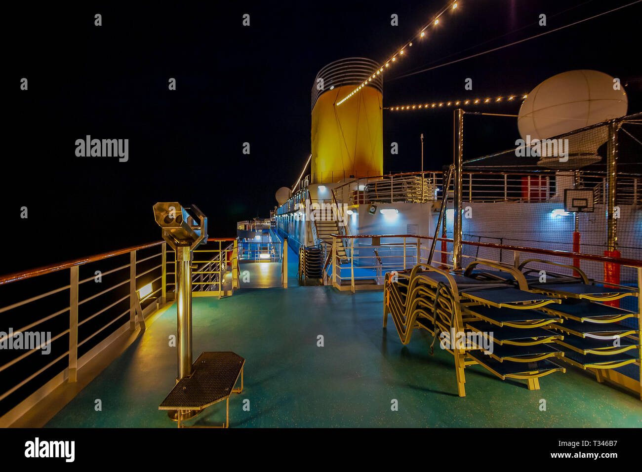 Night view of the illuminated upper deck of cruise ship Stock Photo - Alamy
