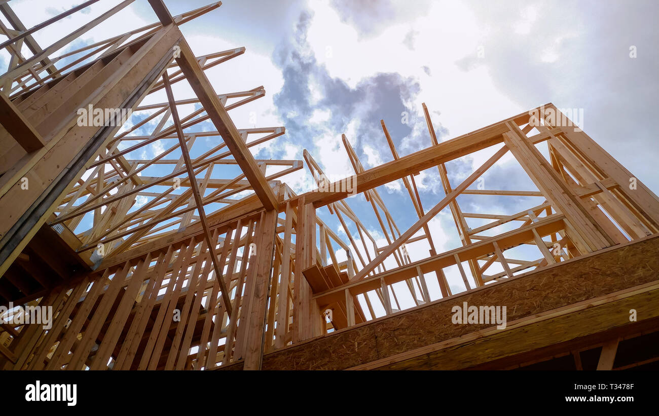 Building of New Home Construction exterior wood frame and beam ...