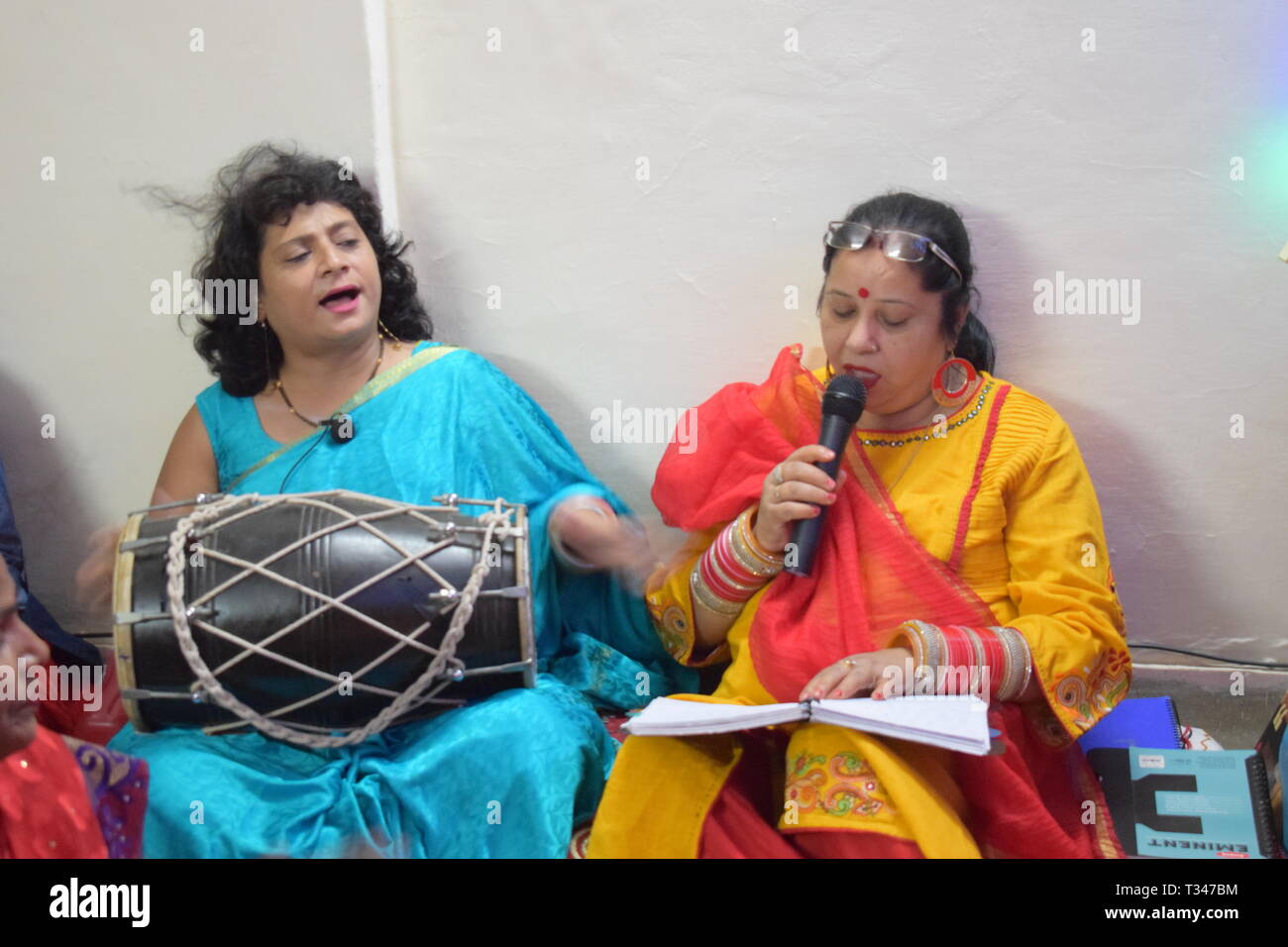 India, Asia - 12 January 2019: Two Indian women singing and playing ...