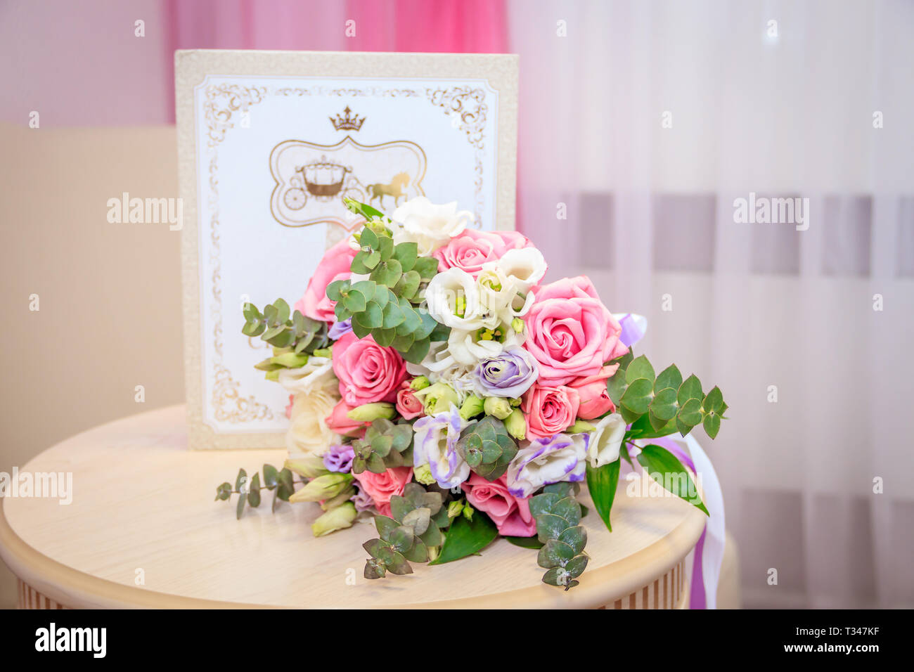 Wedding bridal bouquet on the table. Bouquet with pink roses. Small ...