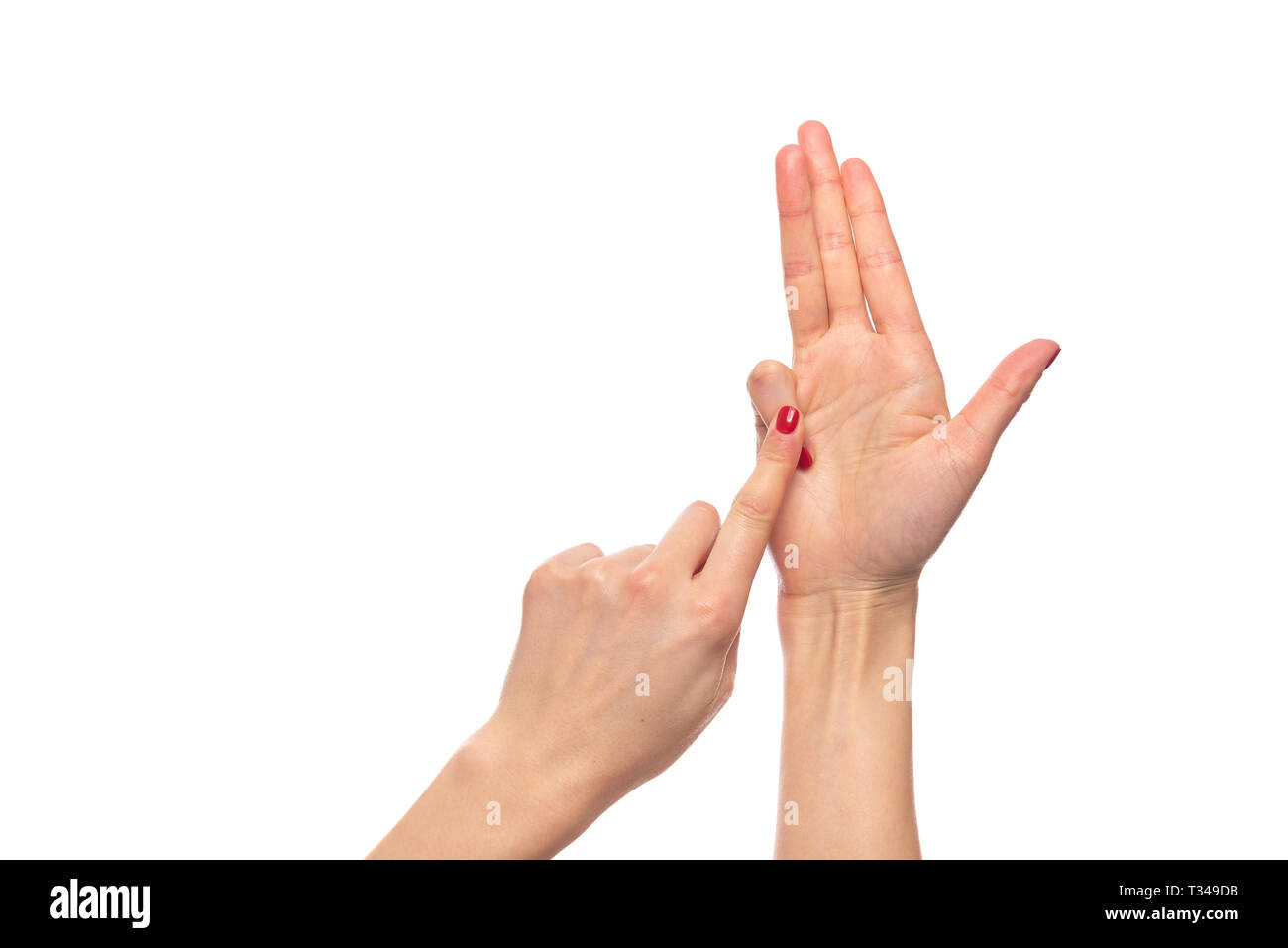 Female hands bend the fingers on white background Stock Photo - Alamy