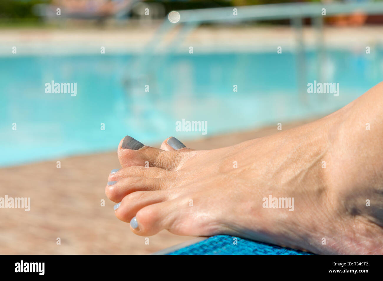 Beautiful feet toes swimming pool hi-res stock photography and images ...