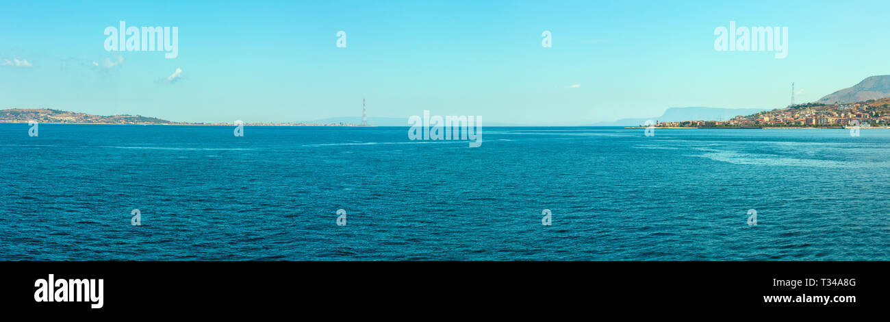 View of the Messina sea strait and coastline from the side of the ferry ...