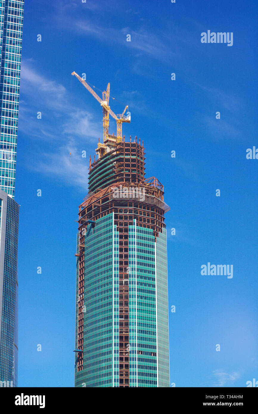 skyscraper develop on sky background Stock Photo - Alamy