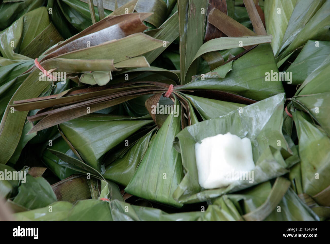 Thai street food, food wrapped in banana leaf Stock Photo - Alamy