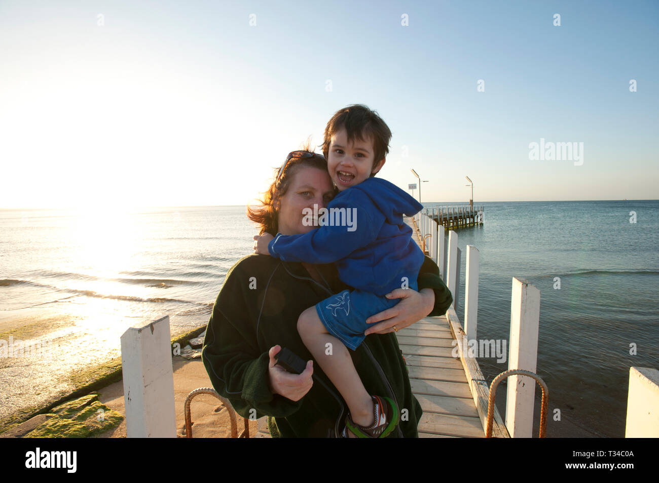 Safety beach jetty sunset hi-res stock photography and images - Alamy