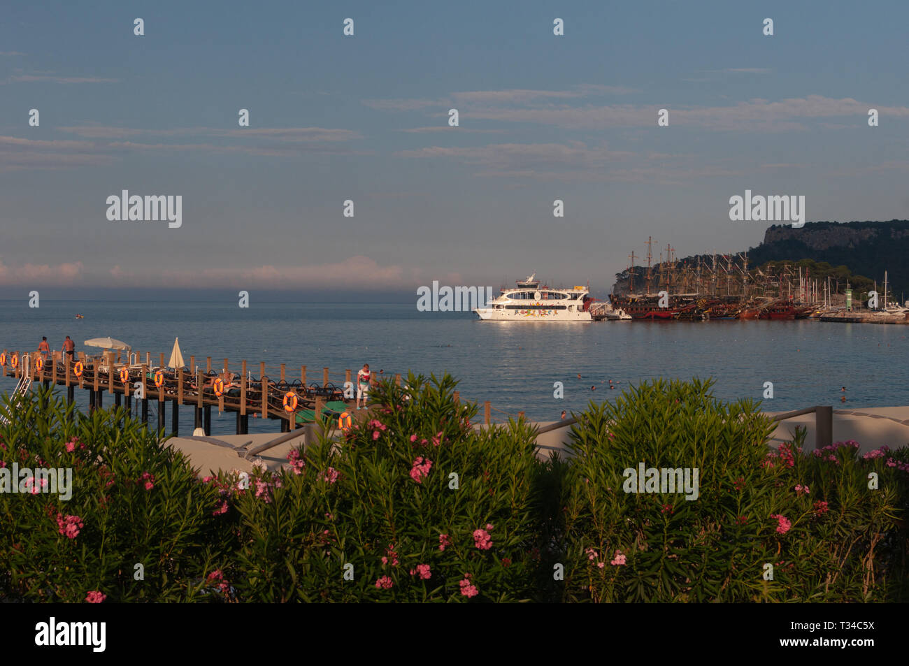 Pier and promenade of the resort on the Mediterranean sea Stock Photo ...