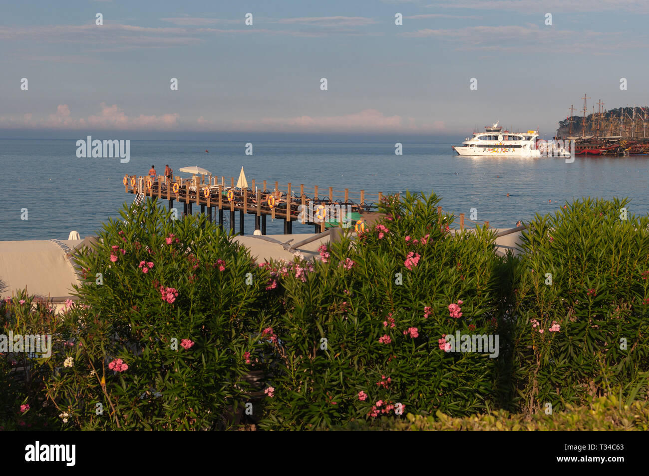 Pier and promenade of the resort on the Mediterranean sea Stock Photo ...