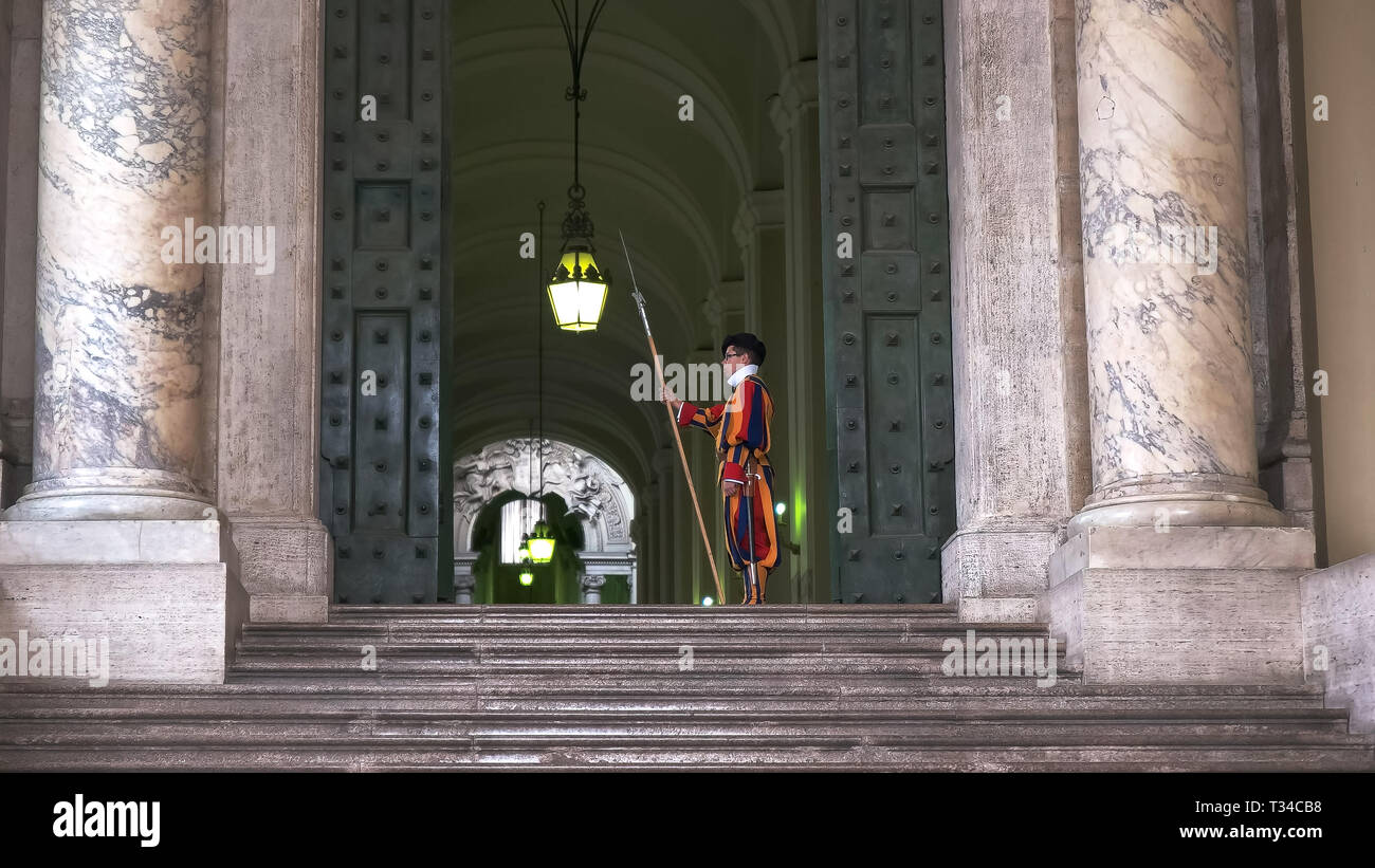 VATICAN STATE- SEPTEMBER 30, 2015: long shot of a swiss guard at saint ...