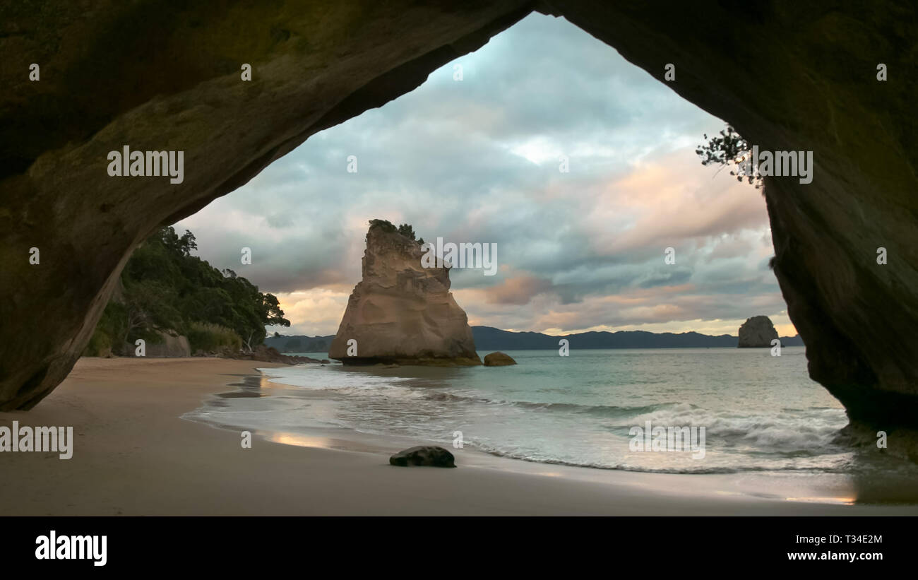 sunset at cathedral cove on the coromandel peninsula in nz Stock Photo ...