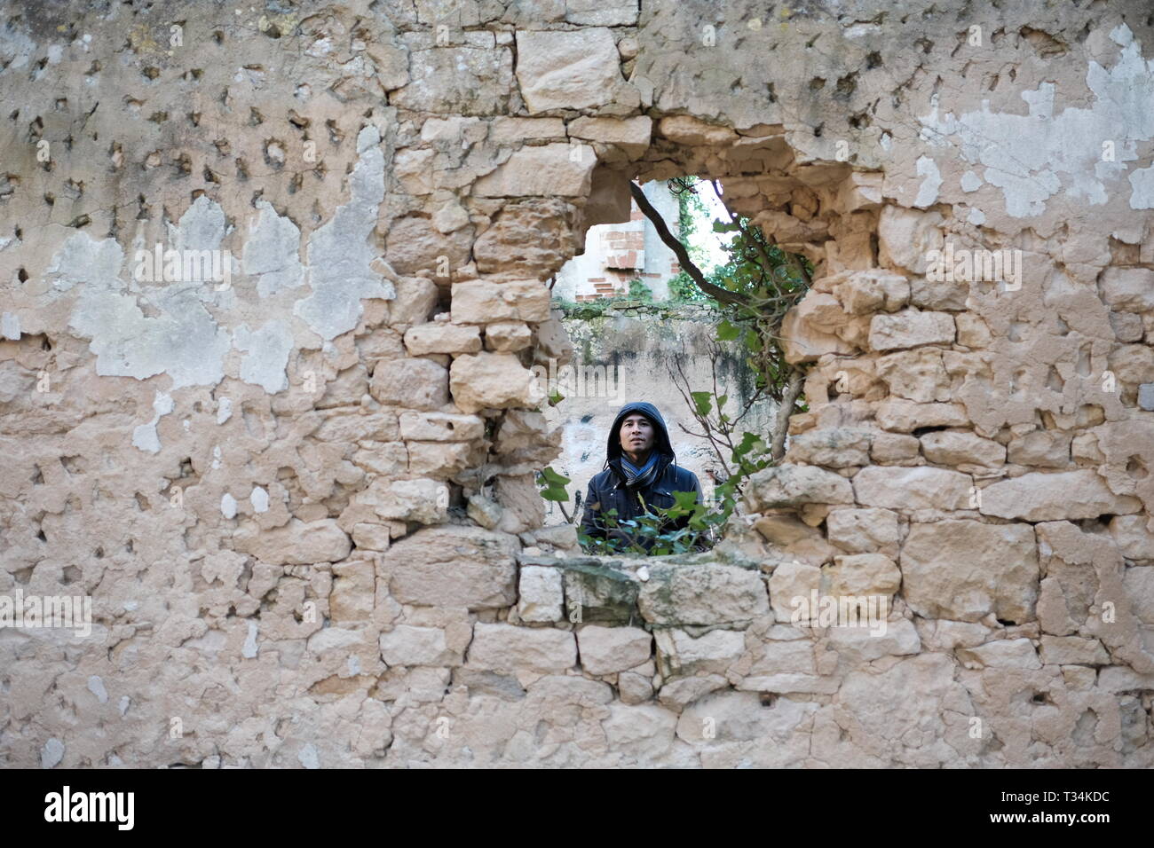 Man looking up hole in hi-res stock photography and images - Alamy