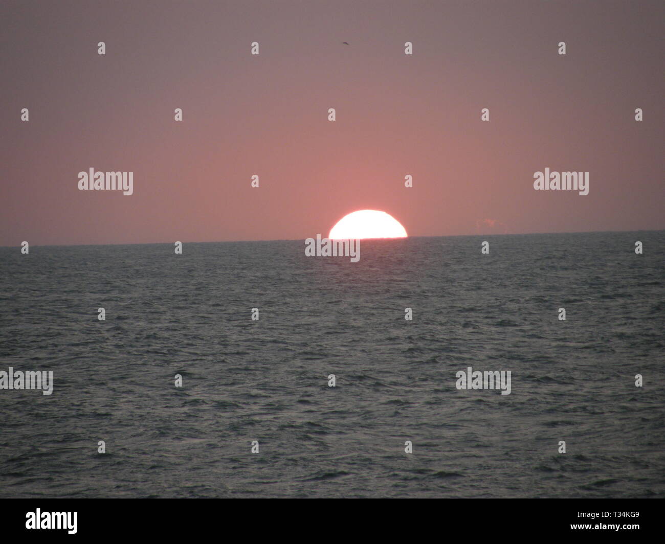 Red sunset at the caribbean sea, Colombia Stock Photo - Alamy
