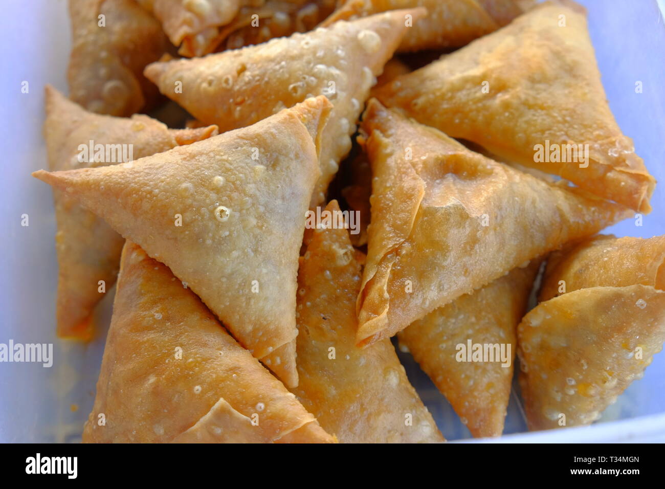 Overhead view of samosas Stock Photo - Alamy