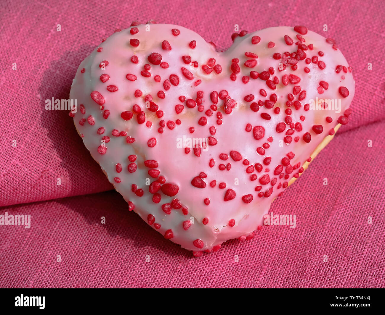 Pink heart sweets hi-res stock photography and images - Alamy