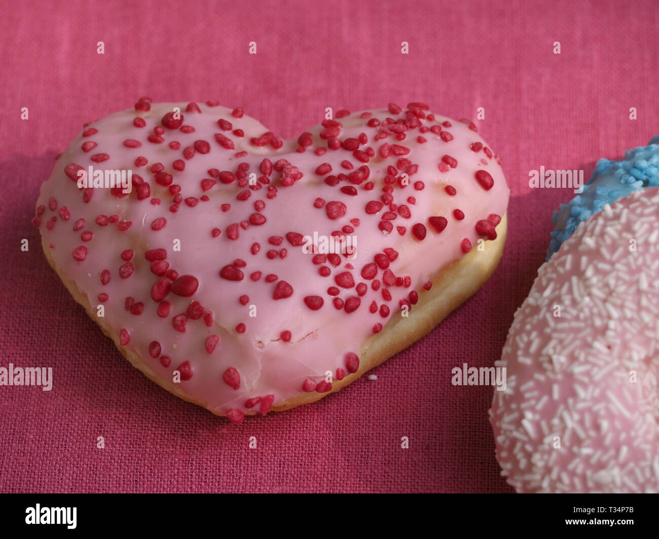 Sweet Doughnut in form of a heart Stock Photo - Alamy