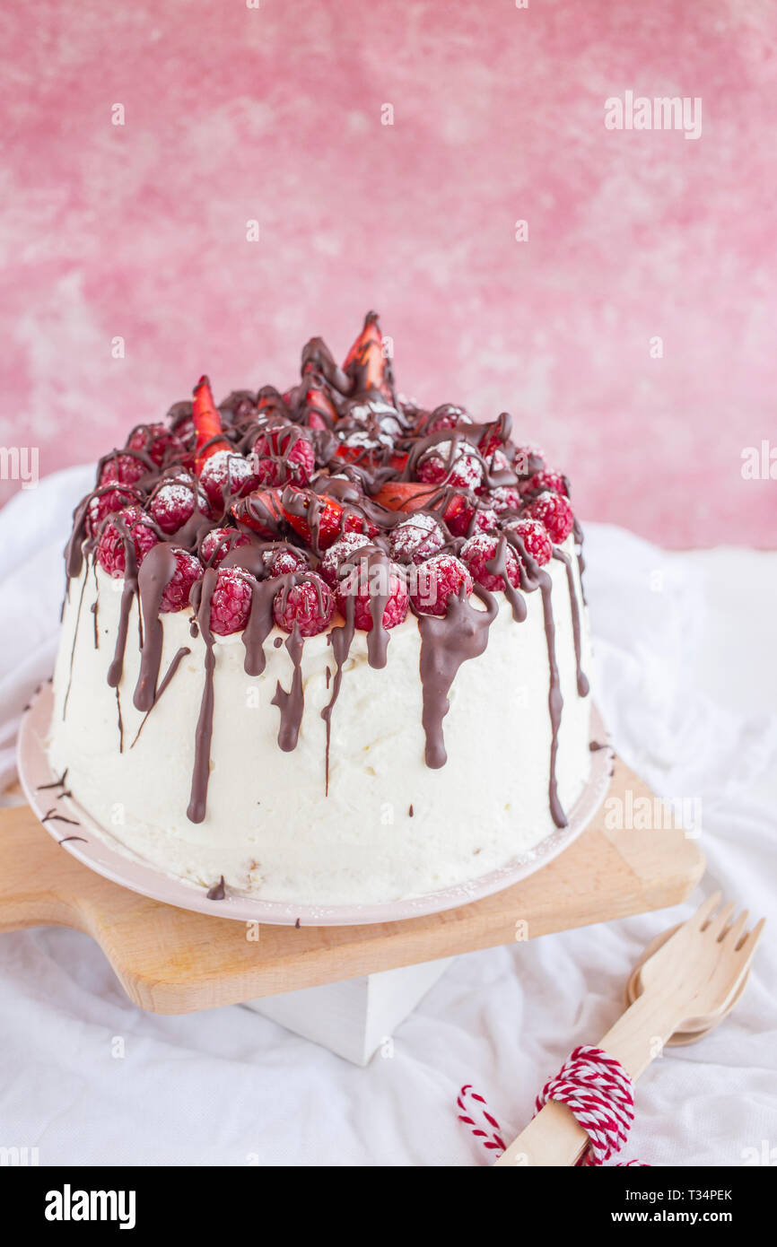 Raspberry and strawberry cream cake with chocolate Stock Photo - Alamy