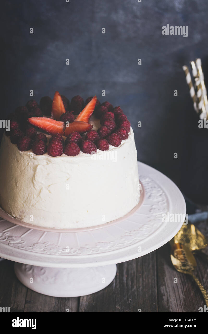 Raspberry and strawberry cream cake with chocolate Stock Photo - Alamy