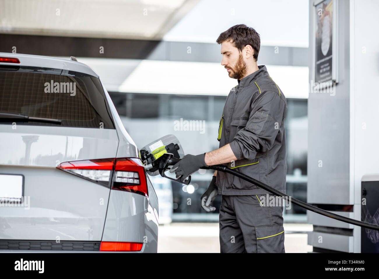 Person filling car with gas hi-res stock photography and images - Alamy