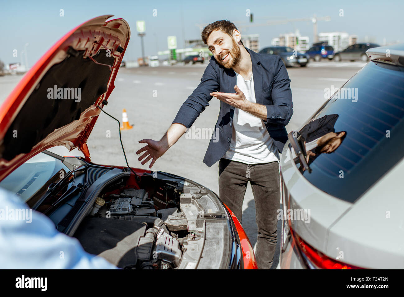 Inspecting the damage hi-res stock photography and images - Alamy