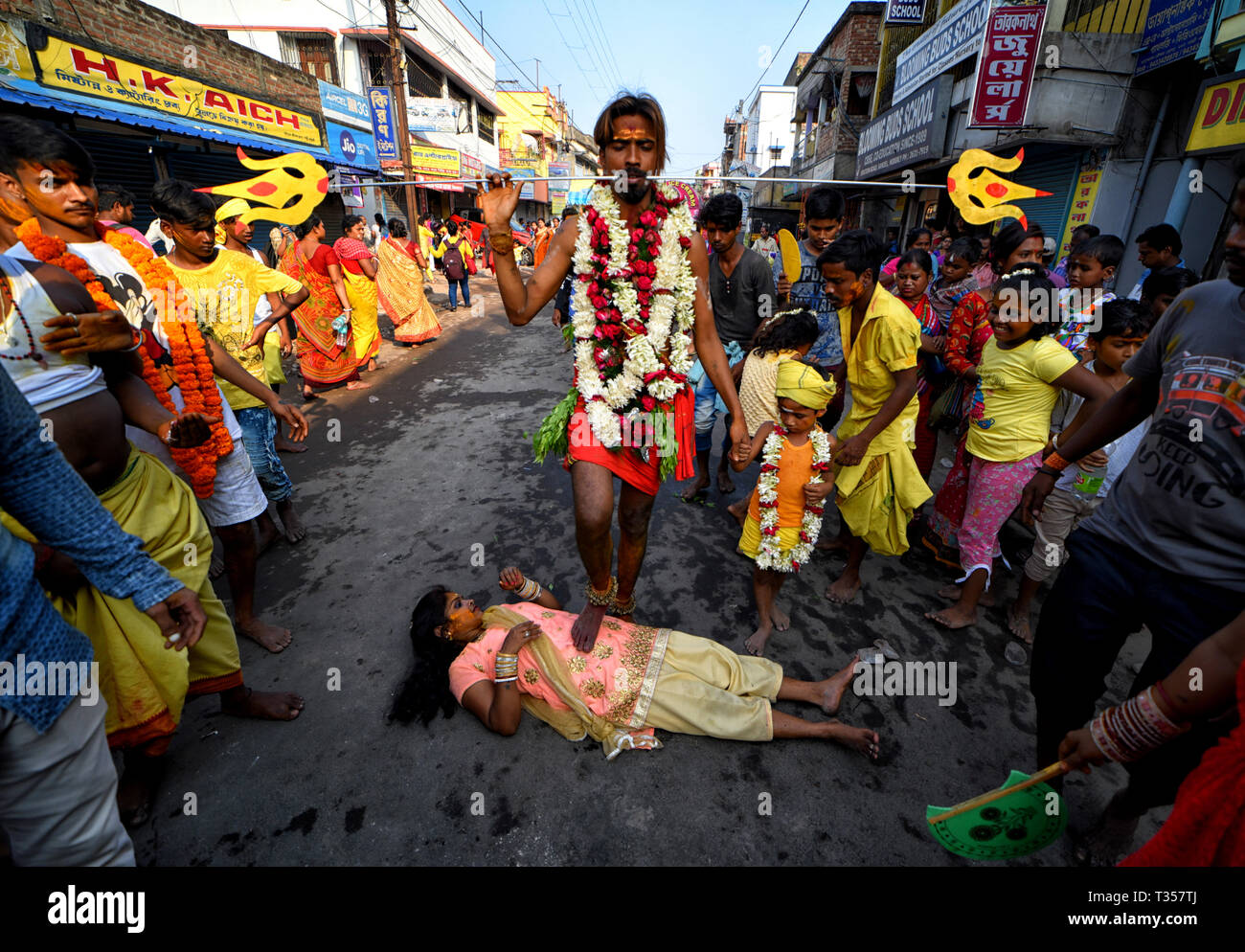 Bandel, India. 06th Apr, 2019. An Hindu devotee seen crossing over an ...