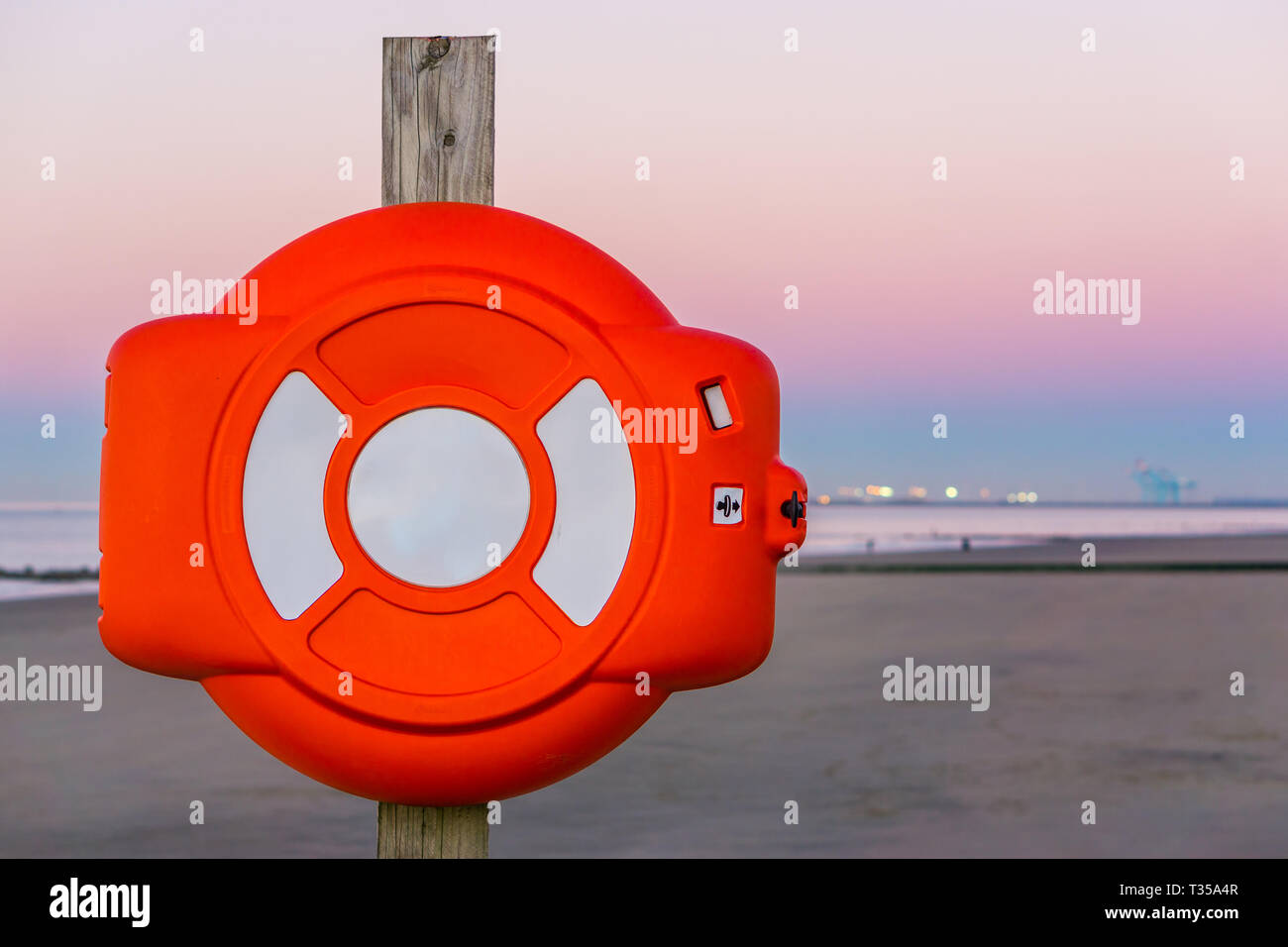 life buoy case on a pole, safety equipment at the belgian coast Stock ...