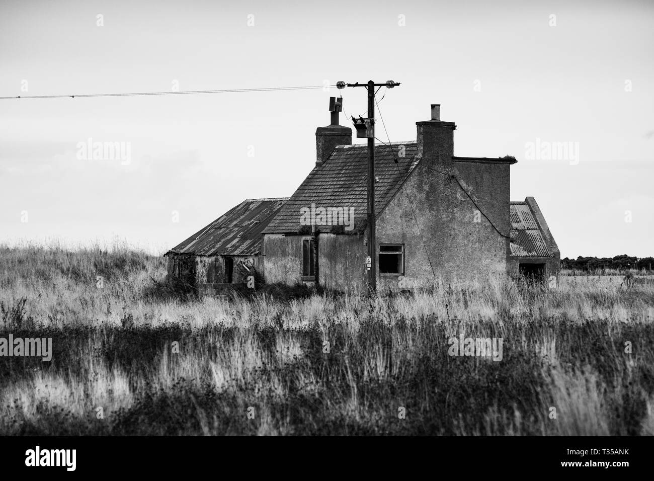 Abandoned house on an industrial estate, a former Second World War air ...